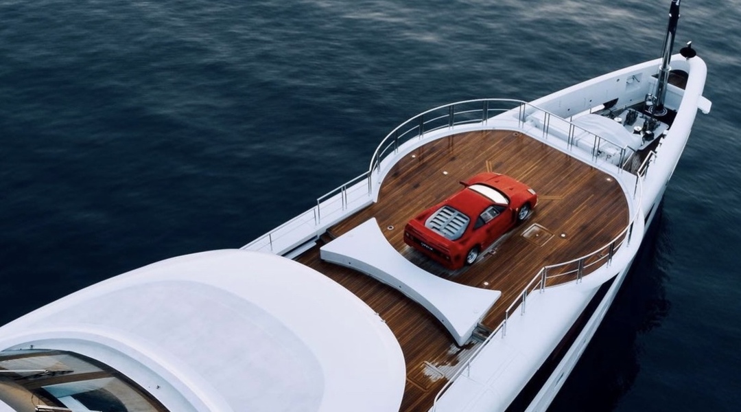 Monaco's Grand Flex: Luxury Car Hoisted Onto 180-Foot Yacht